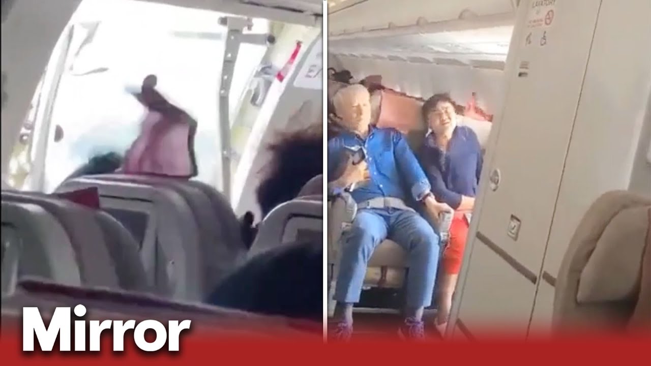 Plane door opens during flight - YouTube