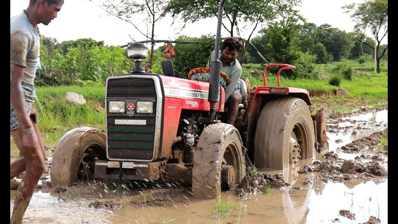 Massey ferguson tractor stuck in mud - YouTube