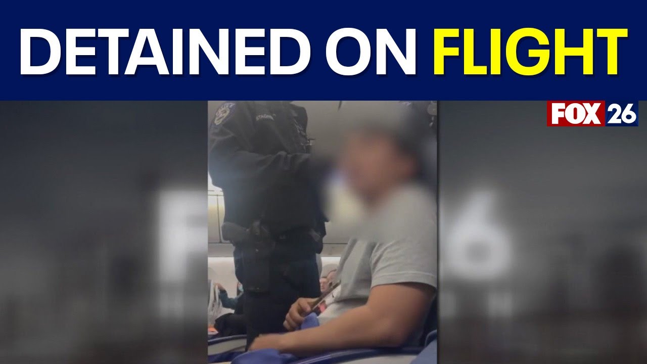 Houston-bound plane diverts to Seattle after passenger tries opening ...