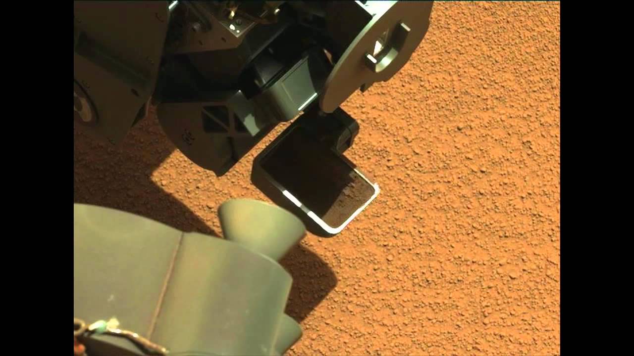 Mars Rover Scooping Dirt