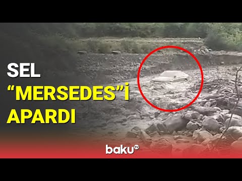 Cülyanda selə düşən avtomobilin görüntüsü