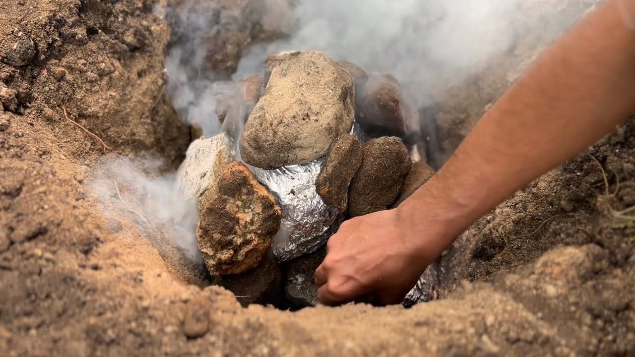 Whole chicken cooked underground in the wild - YouTube