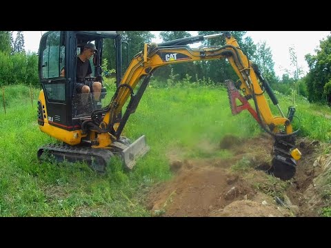 Digging a trench for irrigation pipe. - YouTube