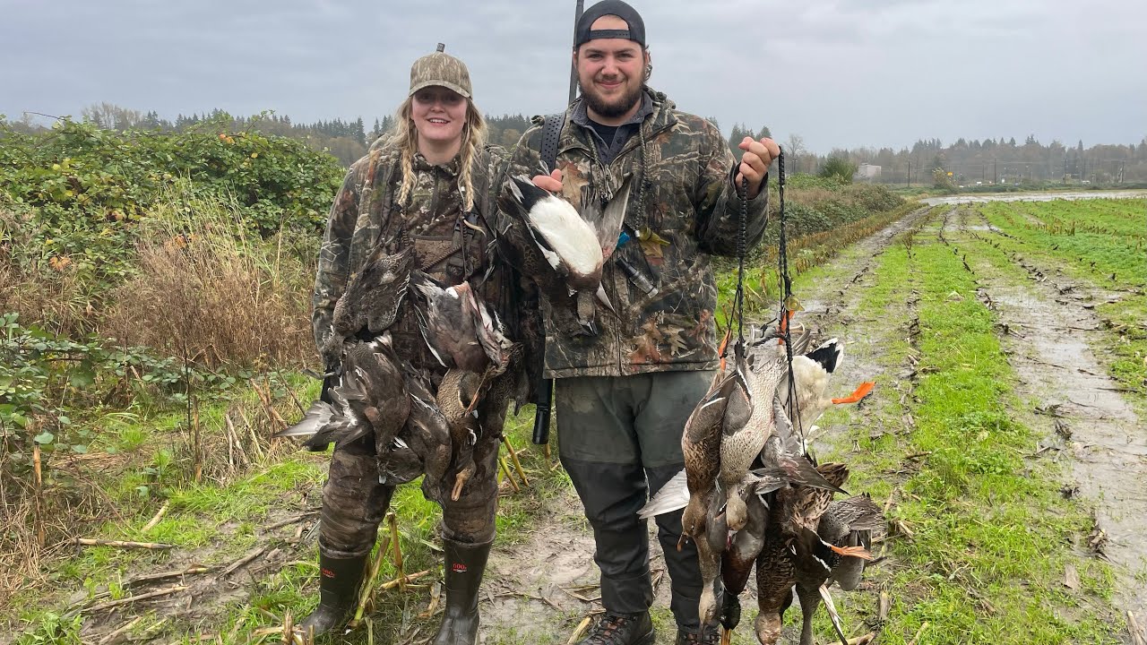 DUCK HUNTING FLOODED CORN IN THE POURING RAIN | EARLY SEASON HUNT - YouTube