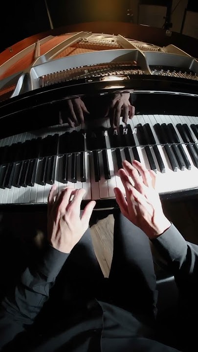 Playing ‘Binary Data IX’ with physical delays on my piano - YouTube