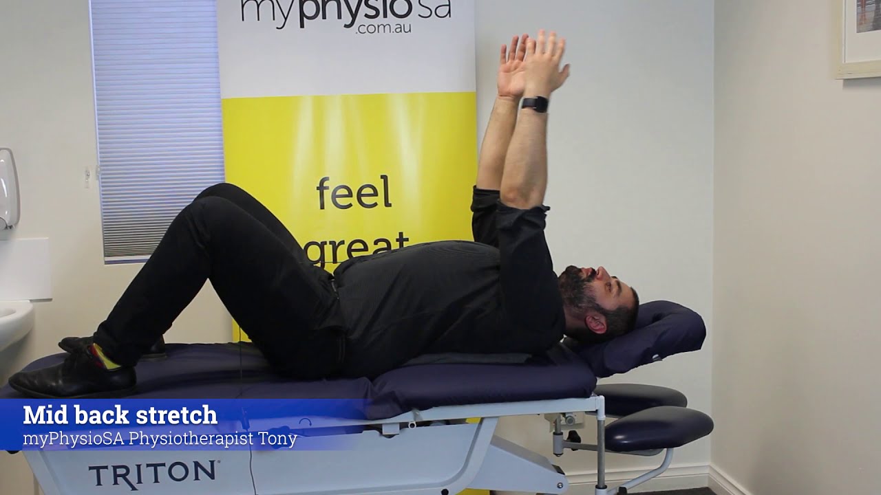 Mid back stretch using a towel - YouTube