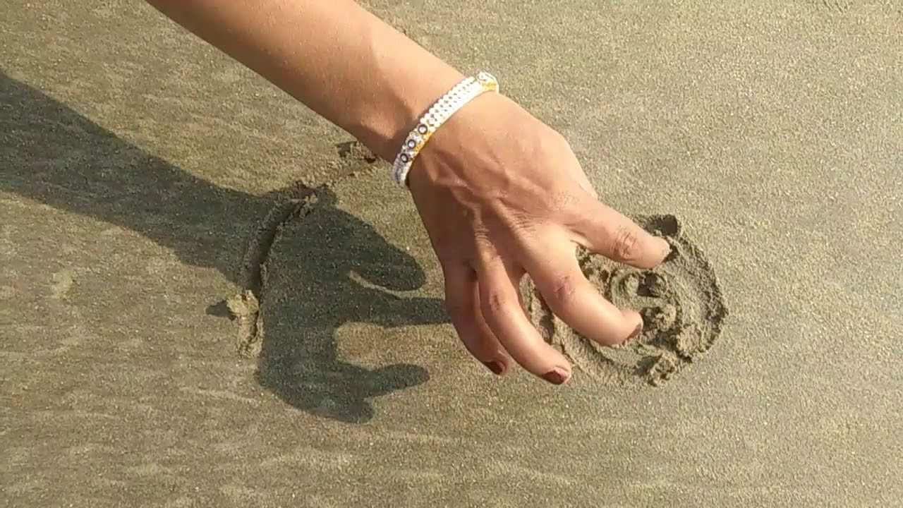 Small rangoli in soil - YouTube