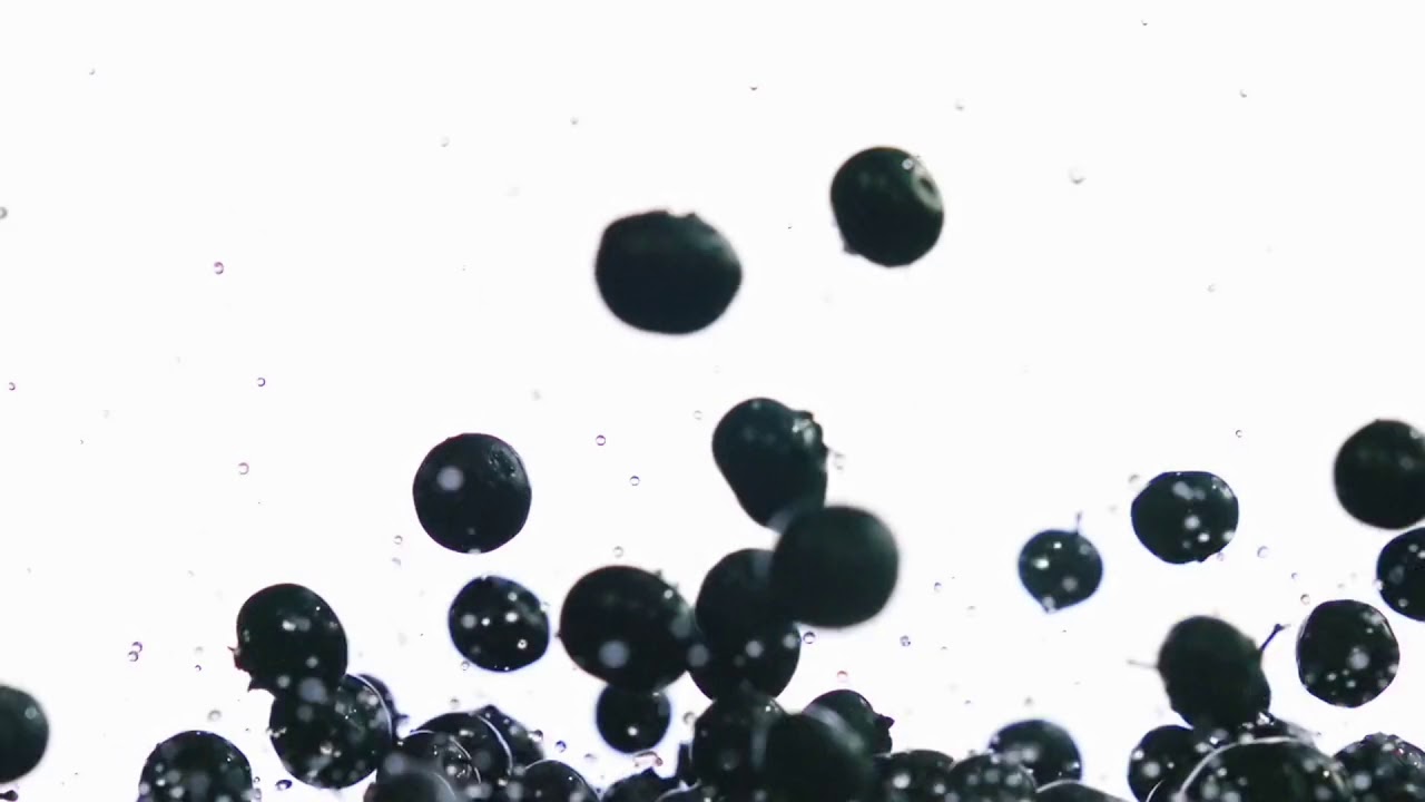 Slow motion falling black berries full HD video - YouTube