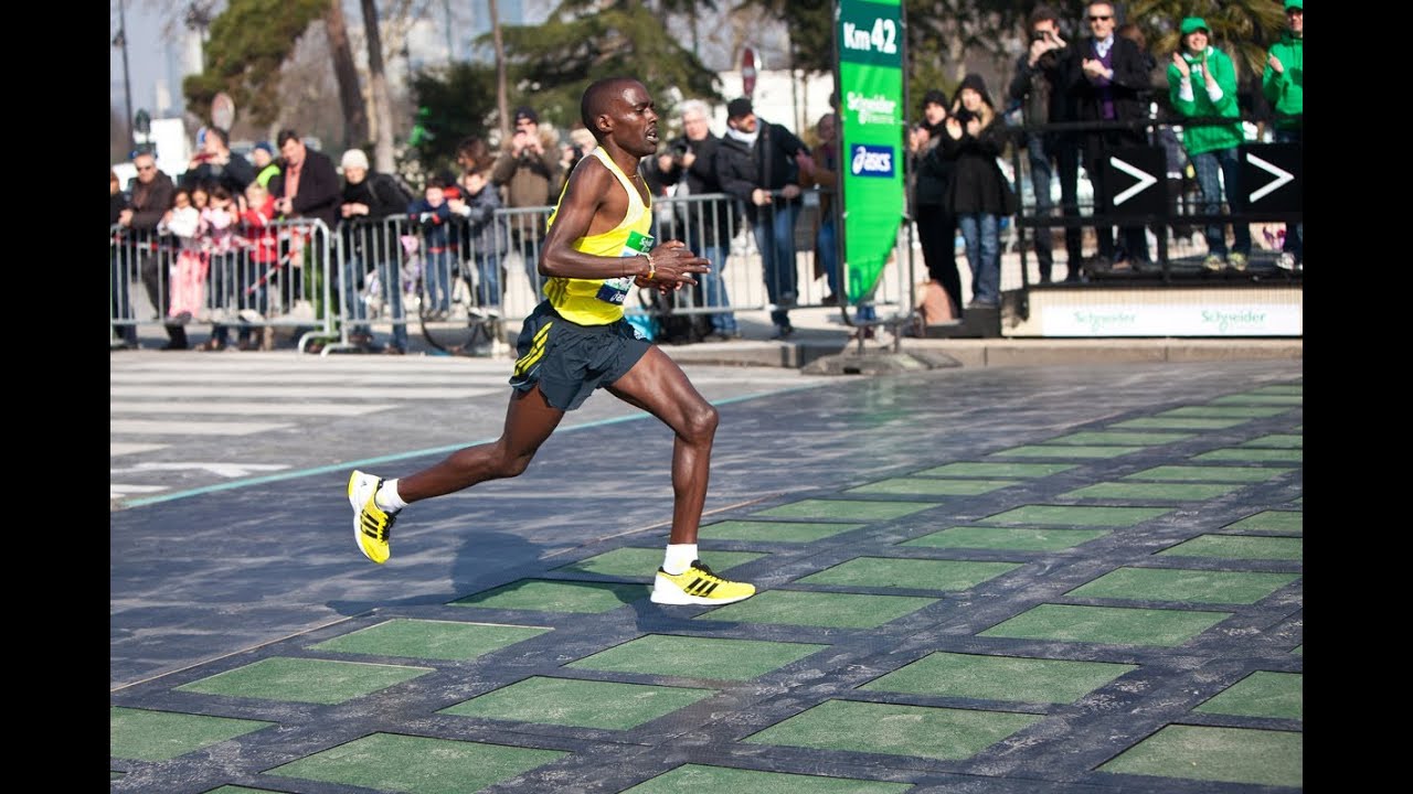 How to use the energy of 37,000 runners on the streets of Paris - YouTube