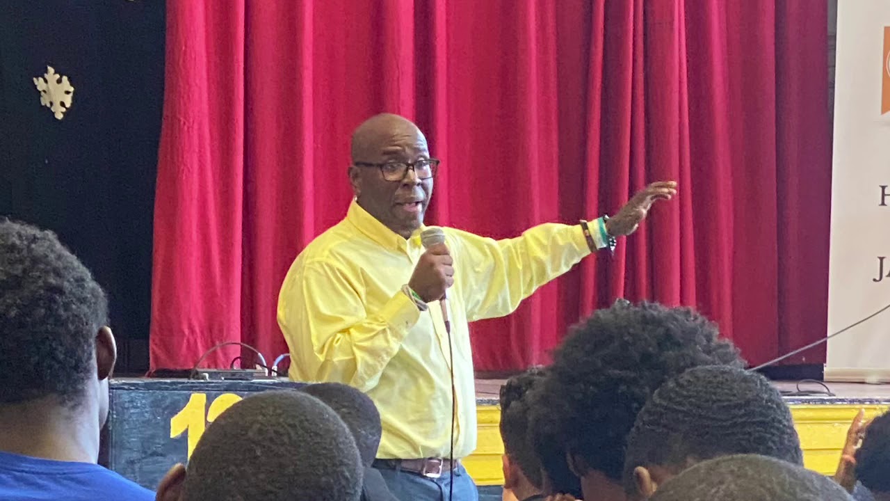 Antwan Rogers uses rap bars to show students the results of fast money ...