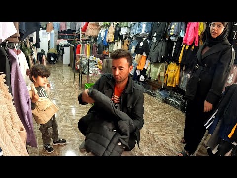 A day in the life of Pia and her daughter; buying clothes at the market