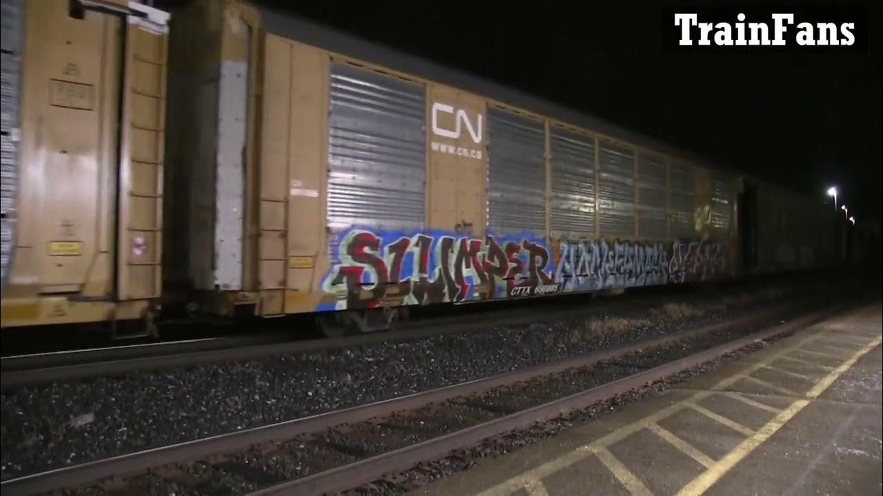 CN M384 Manifest Train Passes The Sarnia VIA Station At Night - YouTube