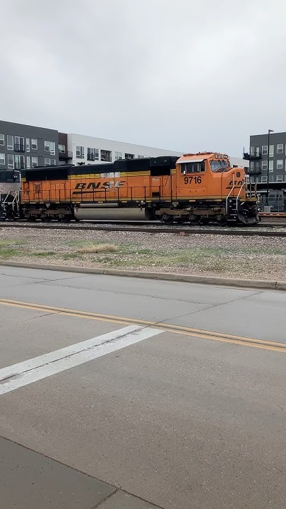 BNSF 9716 idles high at the Longmont depot #bnsf #sd70mac #shorts #train #short #trains # ...