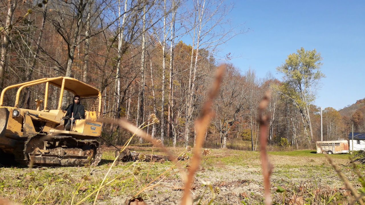 International 500c dozer skidding a log - YouTube