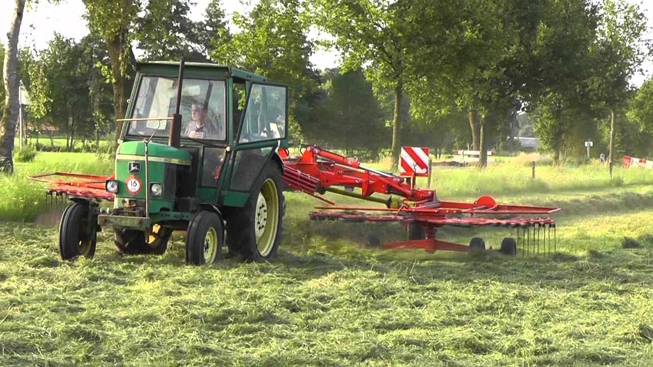 Silage 2011 - Raking with John Deere 1630 (HD) - YouTube
