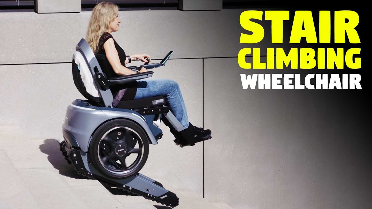 Stair-climbing wheelchair that carries disabled and elderly people on ...