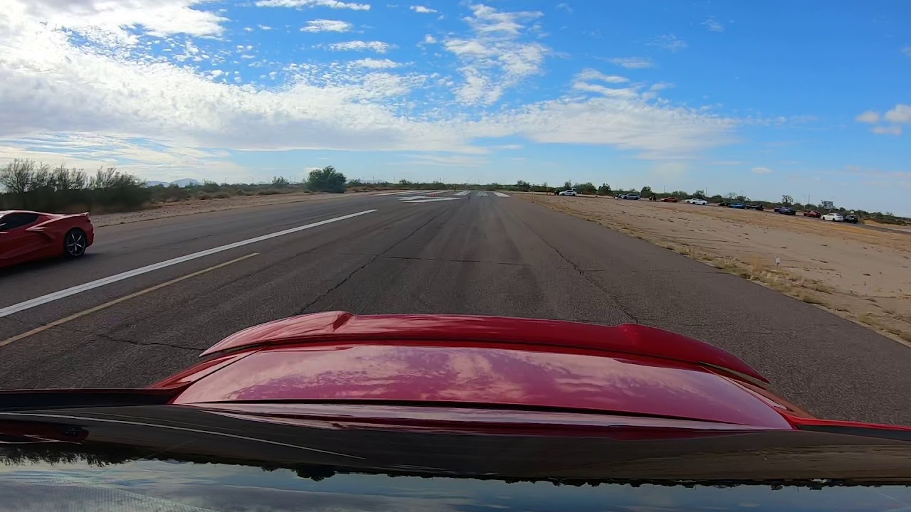 Hellcat Charger vs C8 Corvette half mile race - YouTube