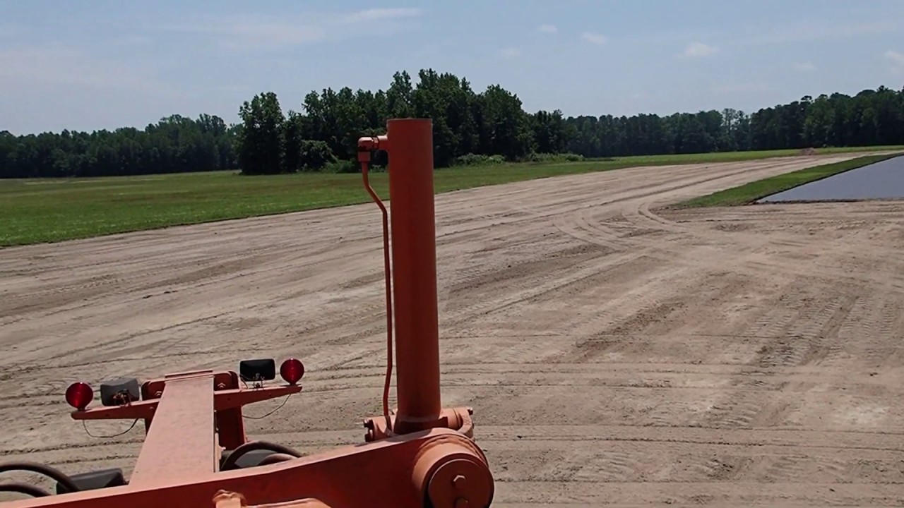 Spreading Topsoil On The Runway - YouTube