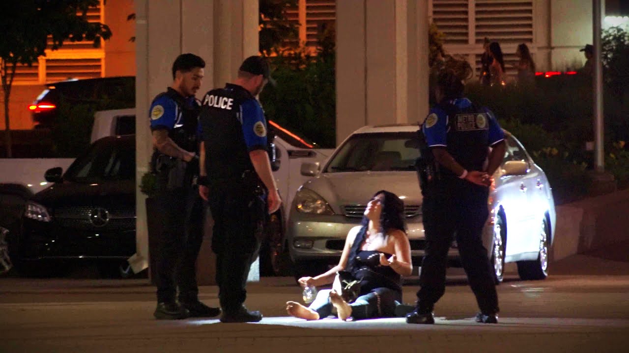 Police responds to drunk woman in hotel parking lot - YouTube