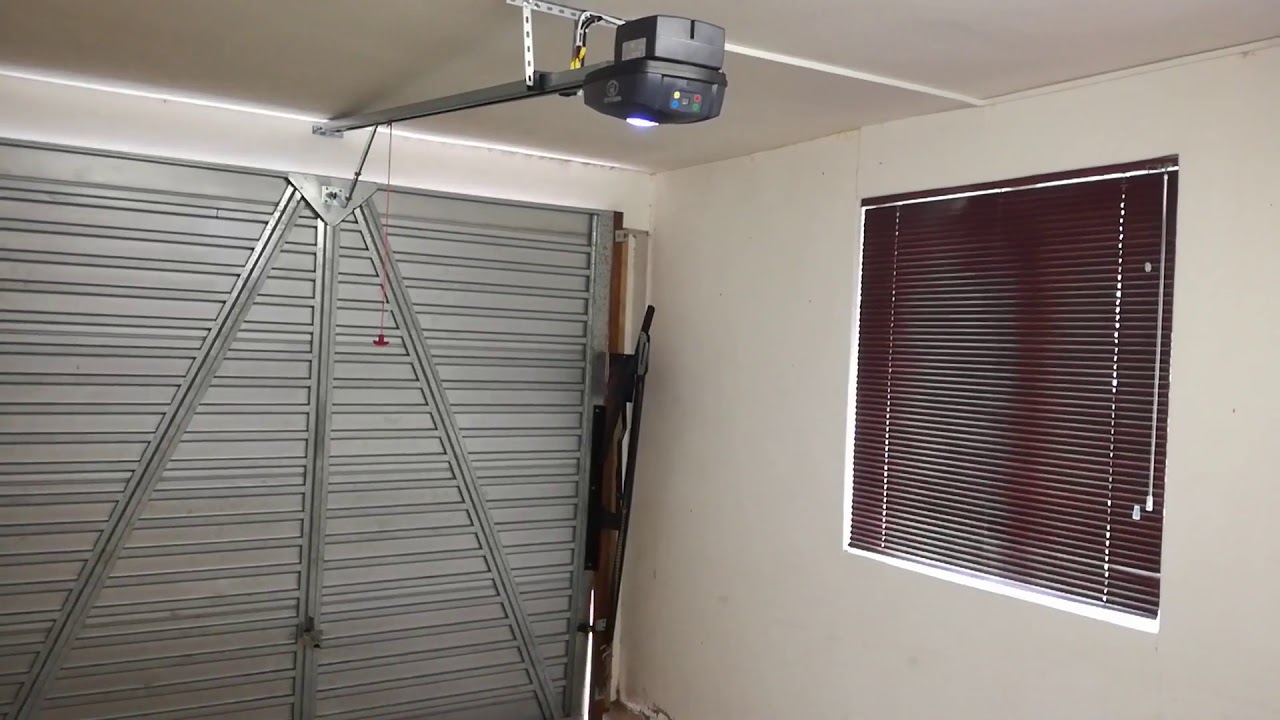 Centurion SDO4 T12 Tip Up Garage door operator. - YouTube
