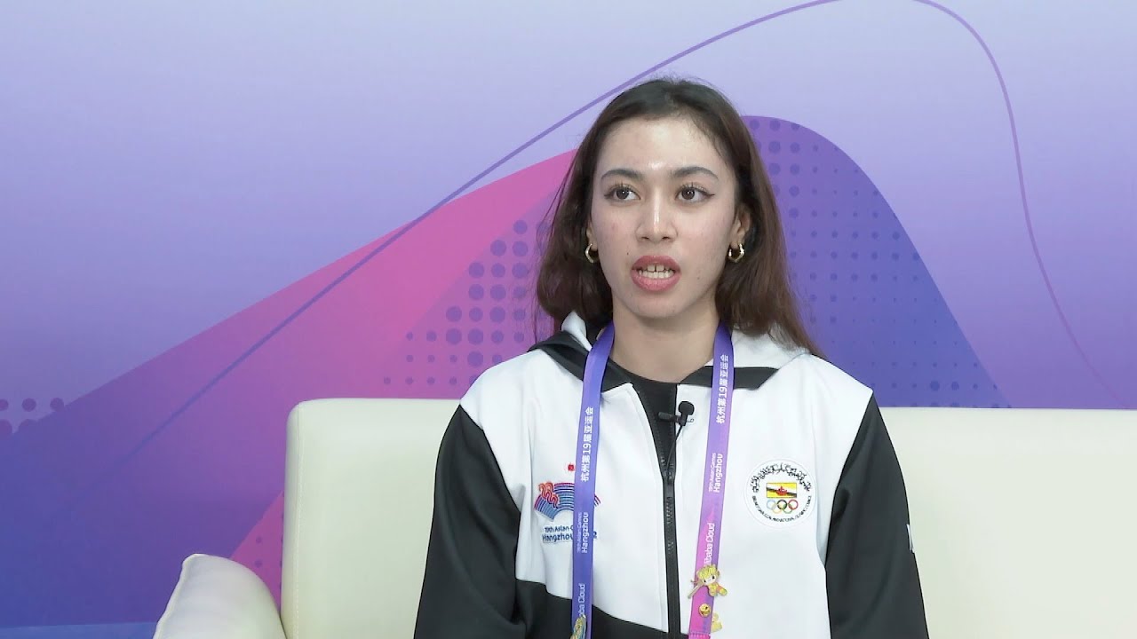 GLOBALink | Chinese coach leads Brunei wushu team to win historic ...