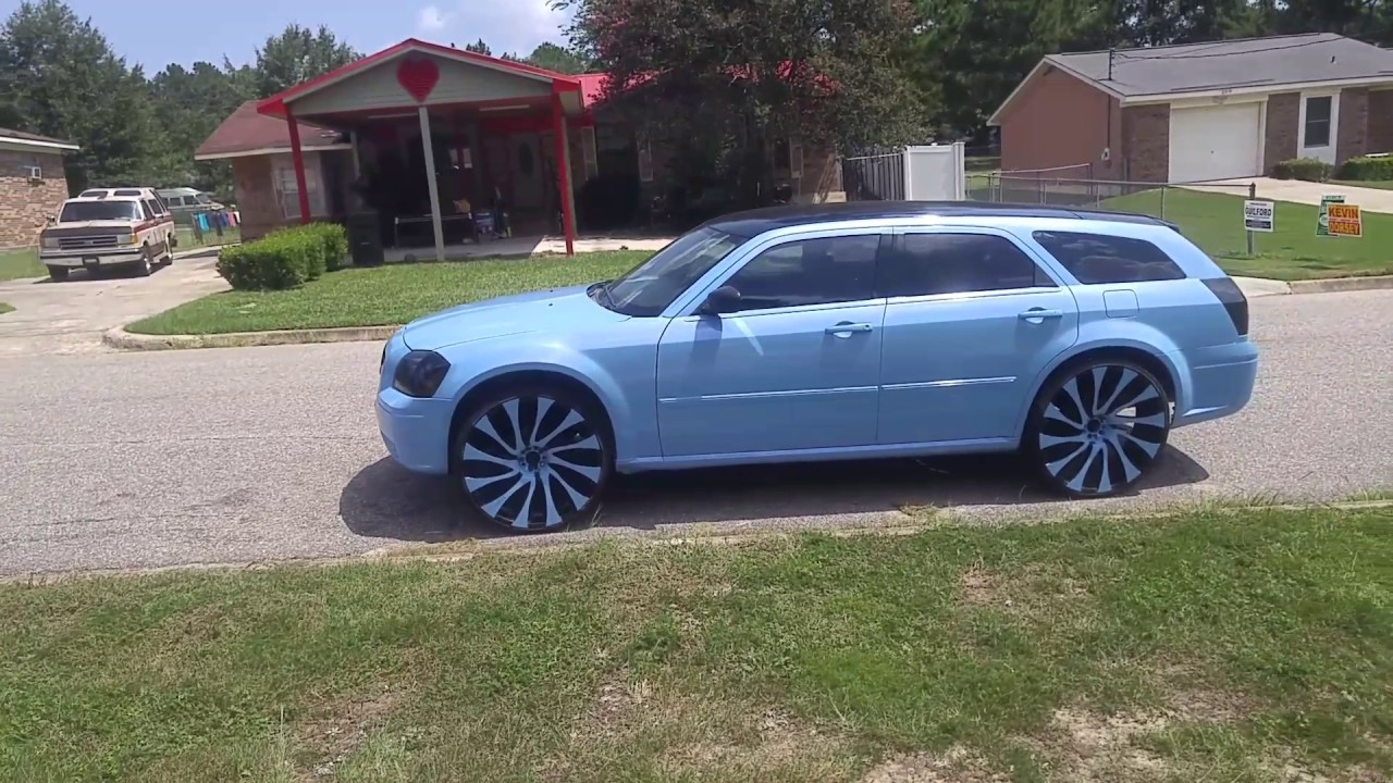 True gritt customs magnum pearl paint job on 26s - YouTube