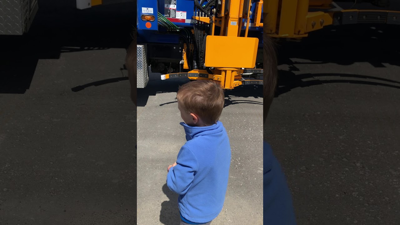 Logan and the grabber arm garbage truck - YouTube