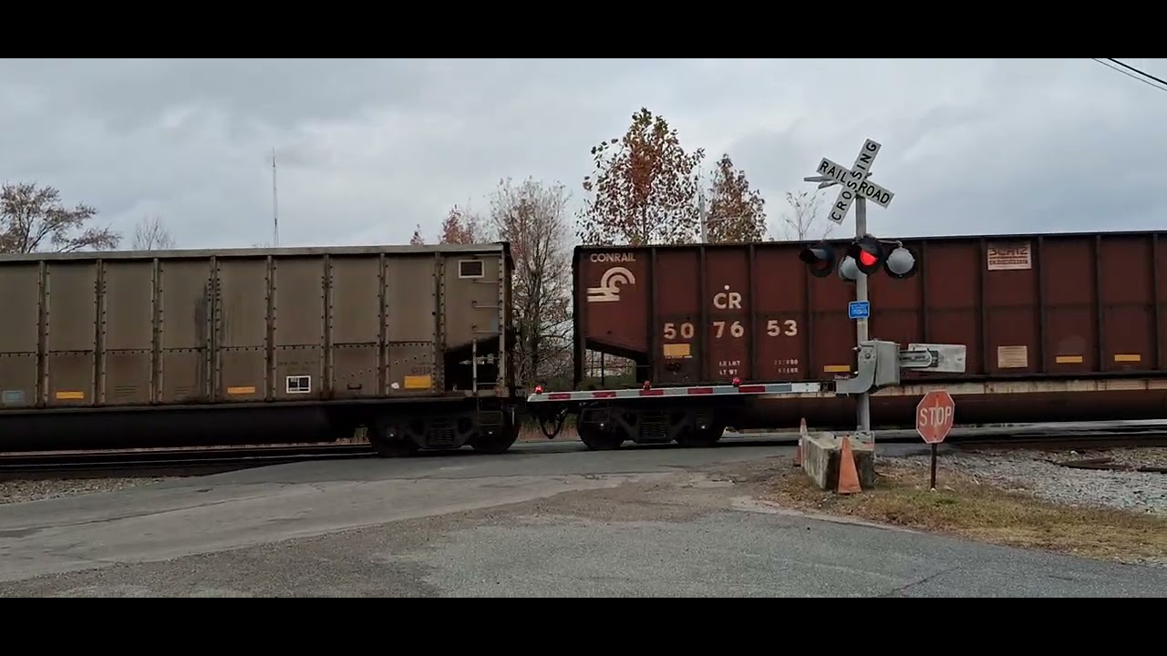 NS empty hopper train crosses shell road - YouTube