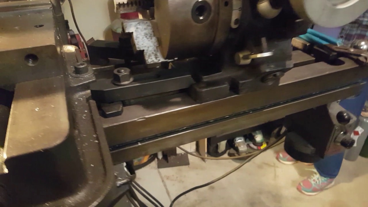 Rotary table with 3 jaw Chuck mounted to Bridgeport table - YouTube