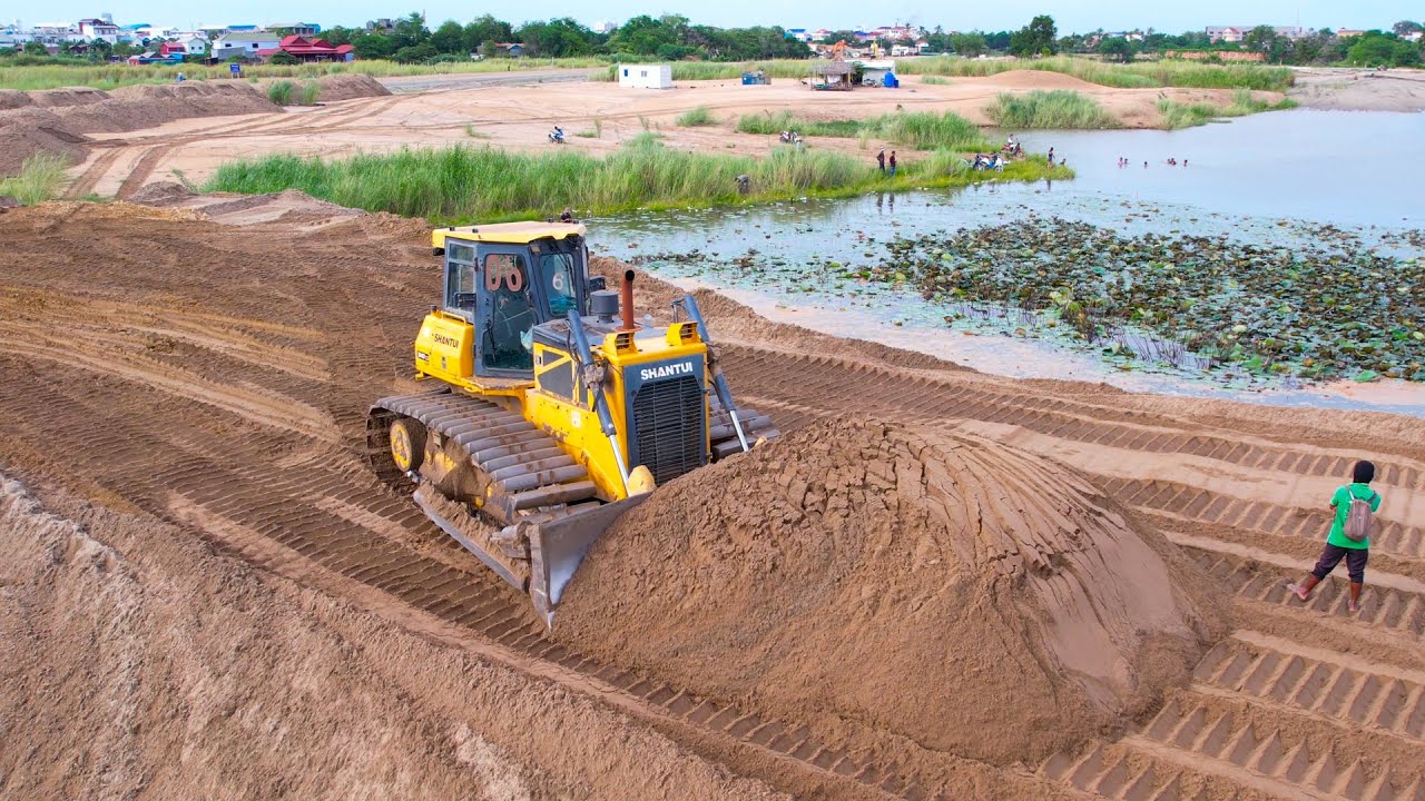 Elegant Machine Operator skills Shantui DH17C2 Pushing Sand On big lake Project with Dump Truck ...