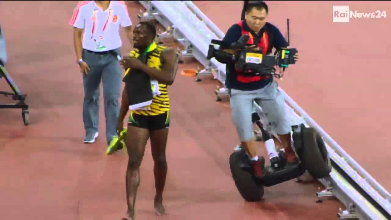 Cameraman on Segway Takes Down Usain Bolt | Usain Bolt Fall Down in ...