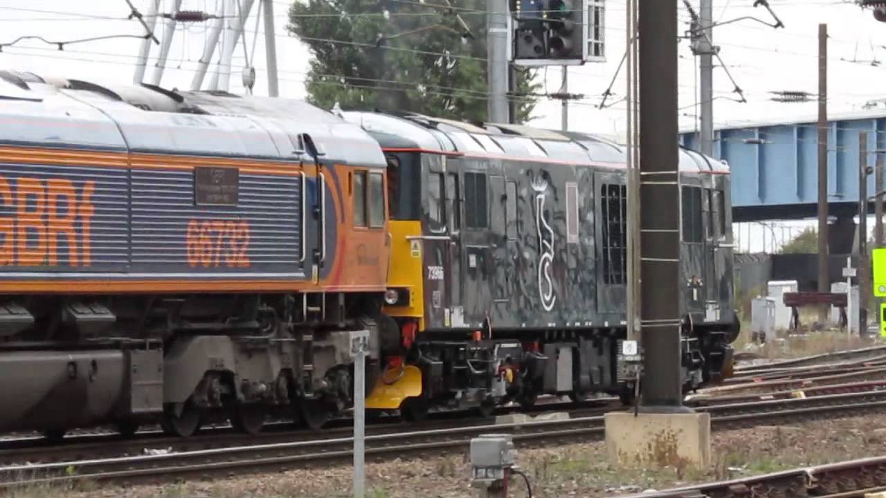 Caledonian sleeper class 73 quietly leaves doncaster with 66 in tow ...