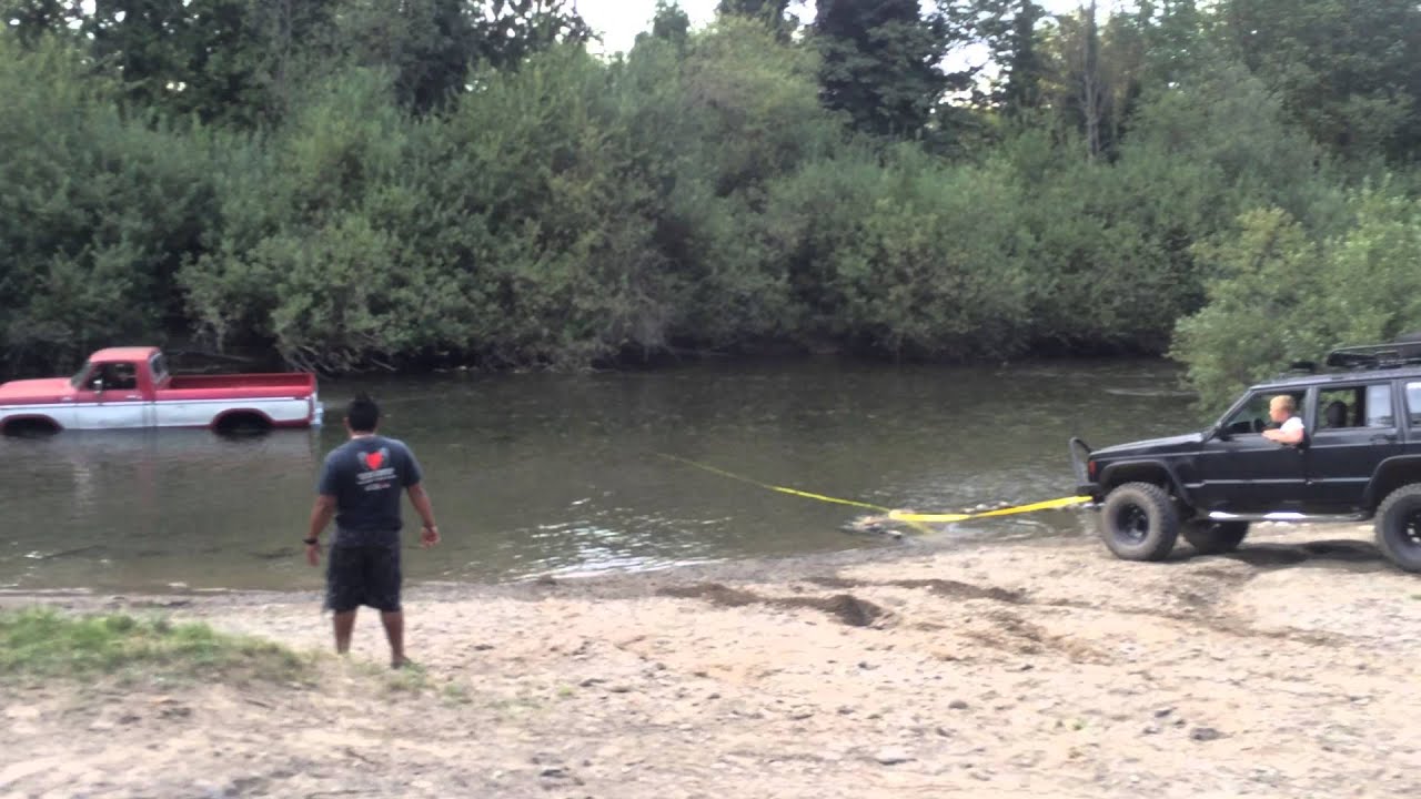 Ford ranger stuck in river rescued by jeep cherokee - YouTube