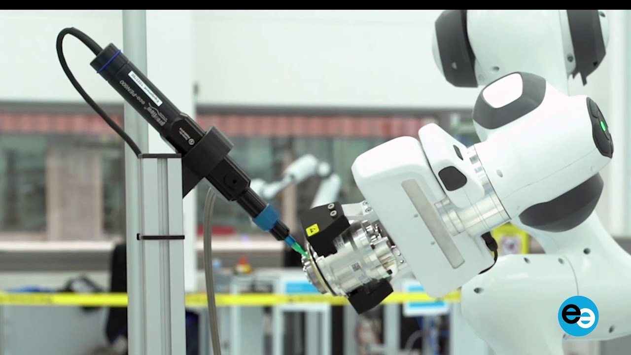 Automated Grease Dispensing in TQ Systems Robot Production - YouTube