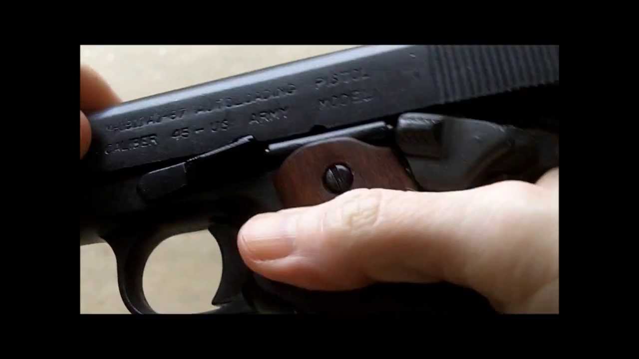 Can the slide lock back on a Denix 1911 replica prop gun? - YouTube