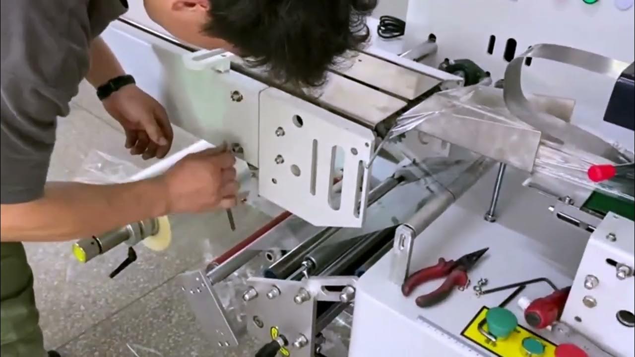 Tutorial demo how to install flow wrap pillow pack equipment - YouTube