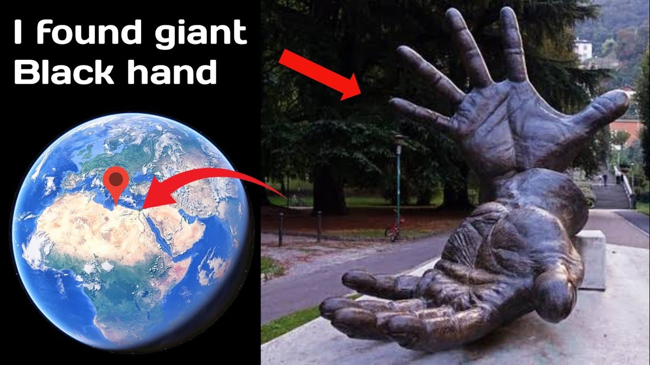 I found giant black hand sculpture on google earth and map - YouTube
