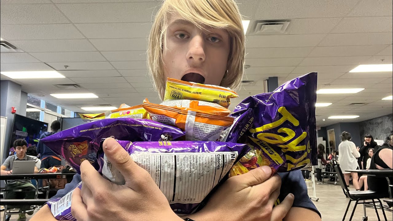 Buying every bag of talkies and hot Cheetos from the vending machine ...