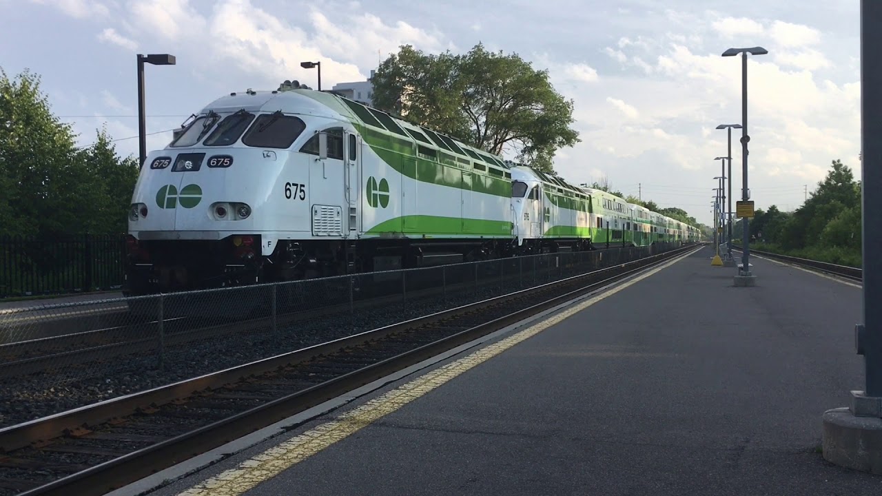 GO Transit and Amtrak trains at Port Credit GO Station - YouTube
