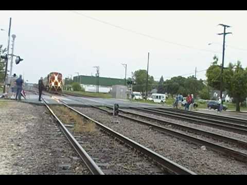 CP intermodal lead by a gevo and a soo line sd 60 leaves bensivlle with ...