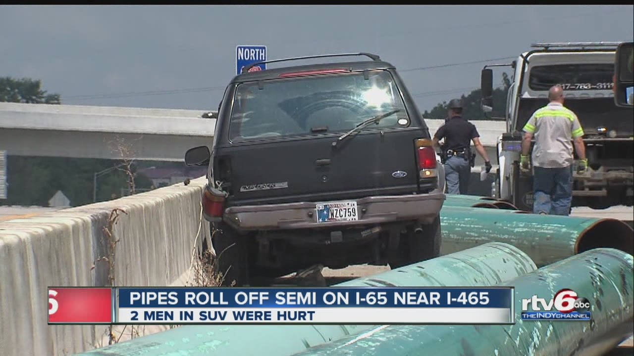 Semi loses load of steel pipes on I-65, 2 hurt - YouTube