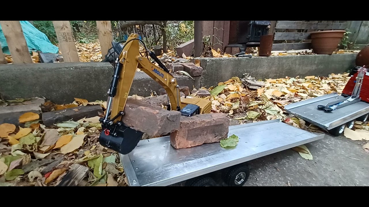 Excavator and 8x8 moving bricks - YouTube