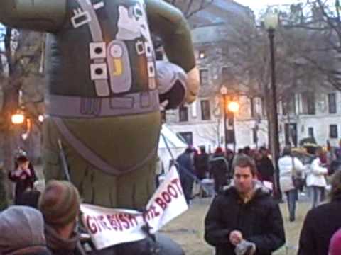 People throwing shoes at an Inflatable Bush - YouTube