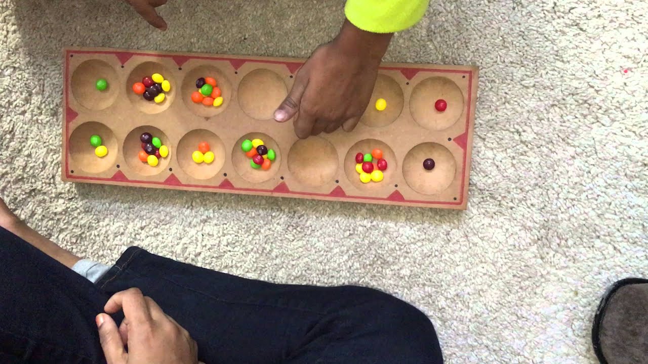 Pallanguzhi - Ancient Indian Game - YouTube