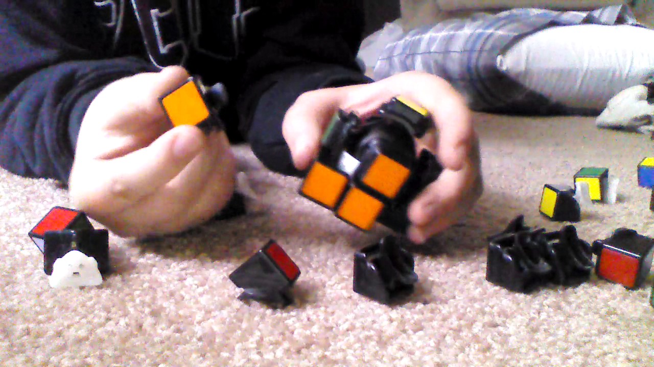 How to take apart a rubix cube - YouTube