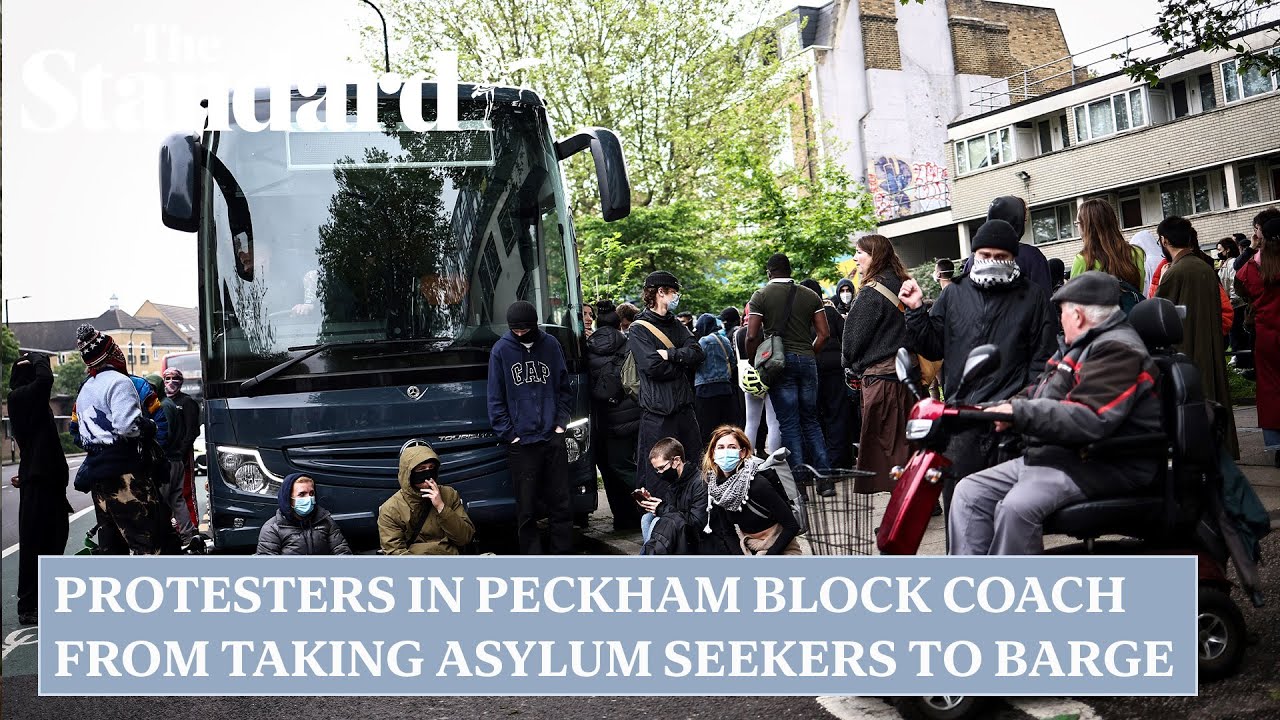'Refugees are welcome here!': Protesters in Peckham block coach from ...
