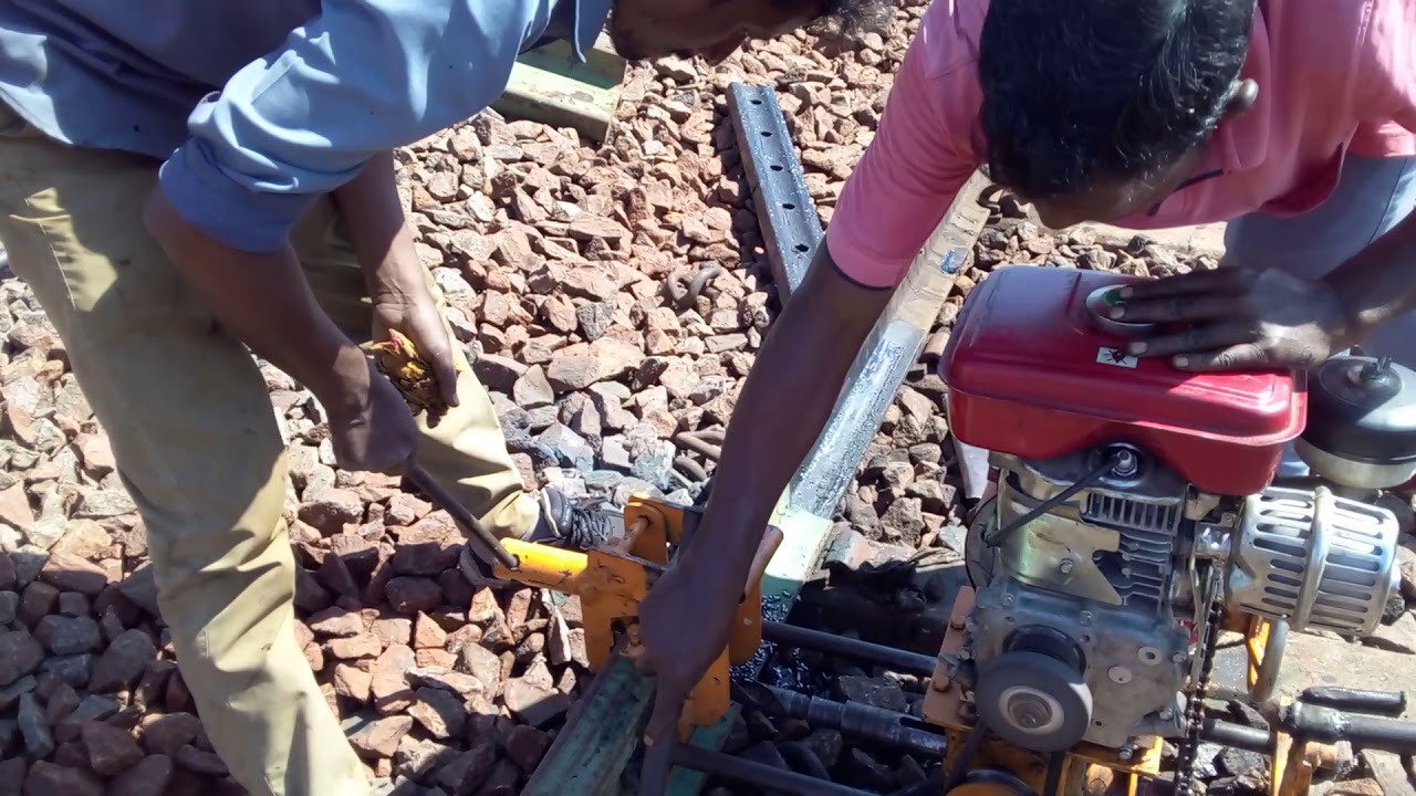 Hole drilling on railway track - YouTube
