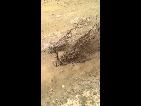 Stuck Stampede VXL throwing up some mud