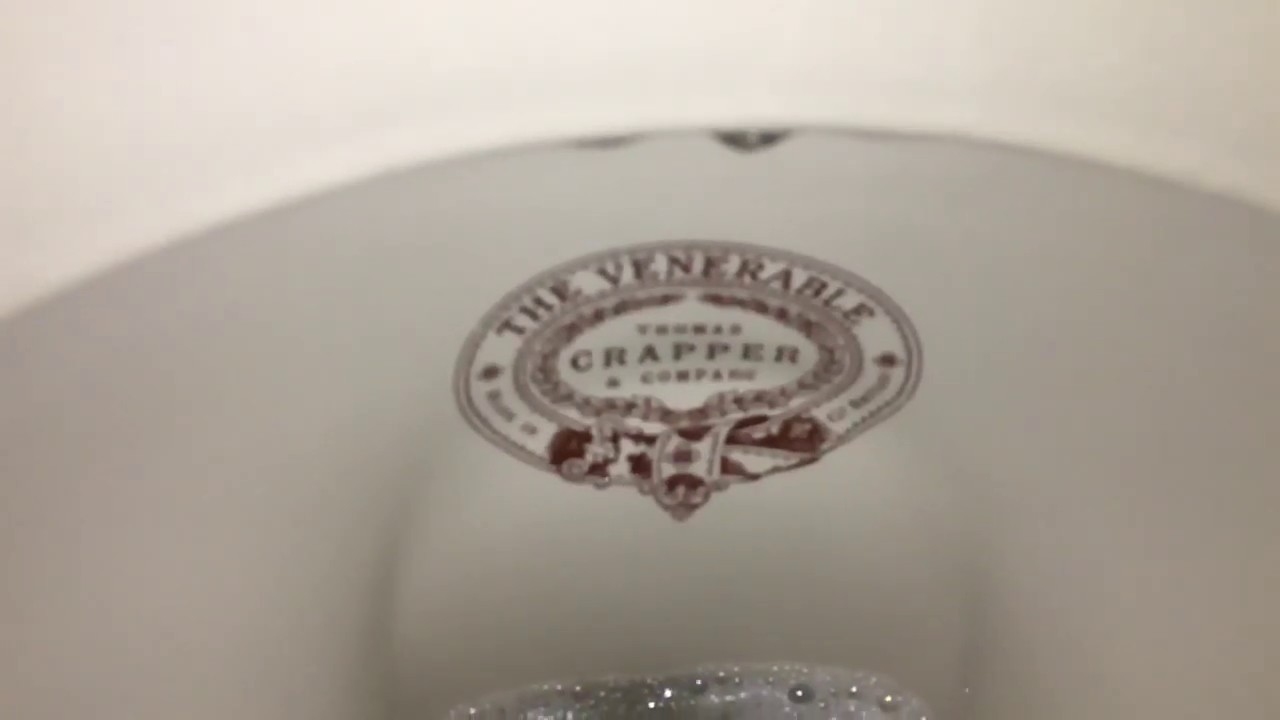 The crapper flushing paper in slow motion! - YouTube