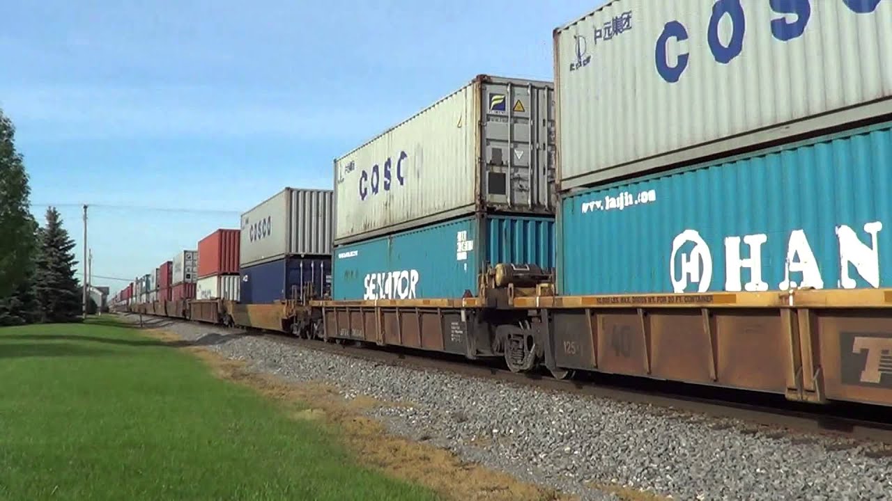 BC Rail C44-9W leads the Q195 through Chebanse IL with IC Blue Devil ...